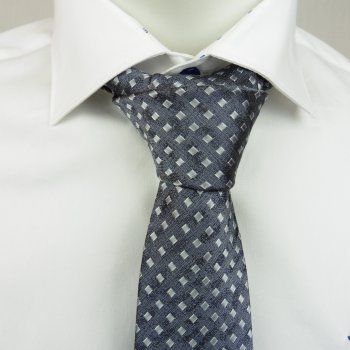 La Corbata, Su Origen y Cómo Anudarla